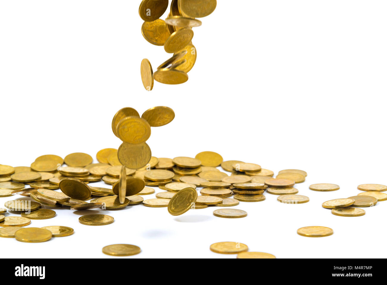 Falling gold coins money isolated on the white background, business ...