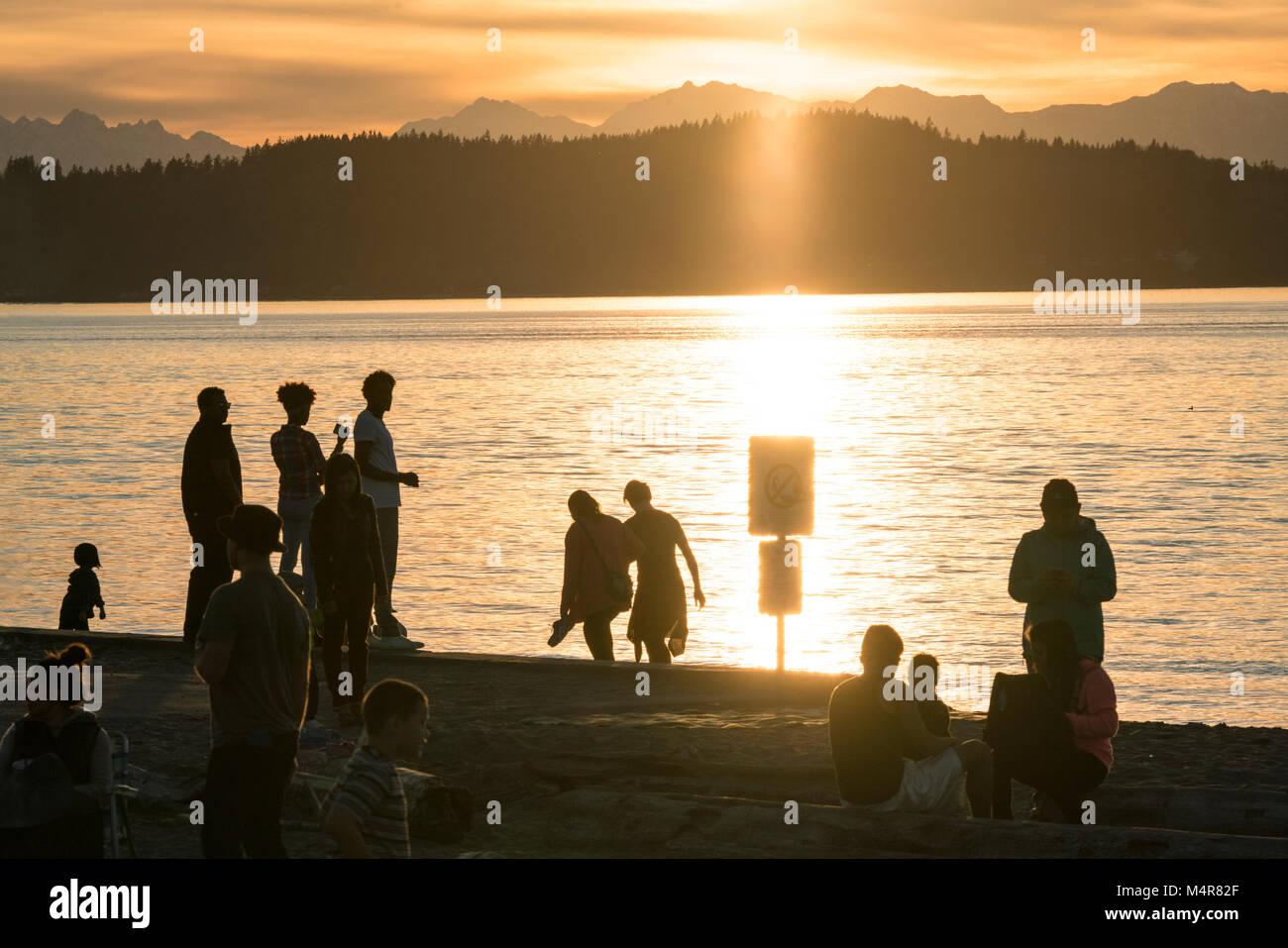 People enjoying the sunset on Alki Beach, Seattle Washington, USA Stock ...