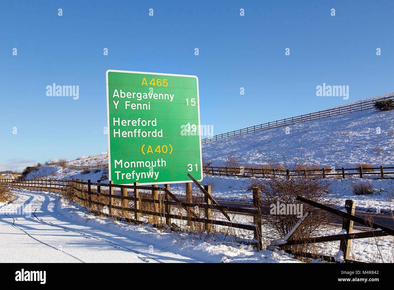 Road sign on the A465 with directional and milage information to ...