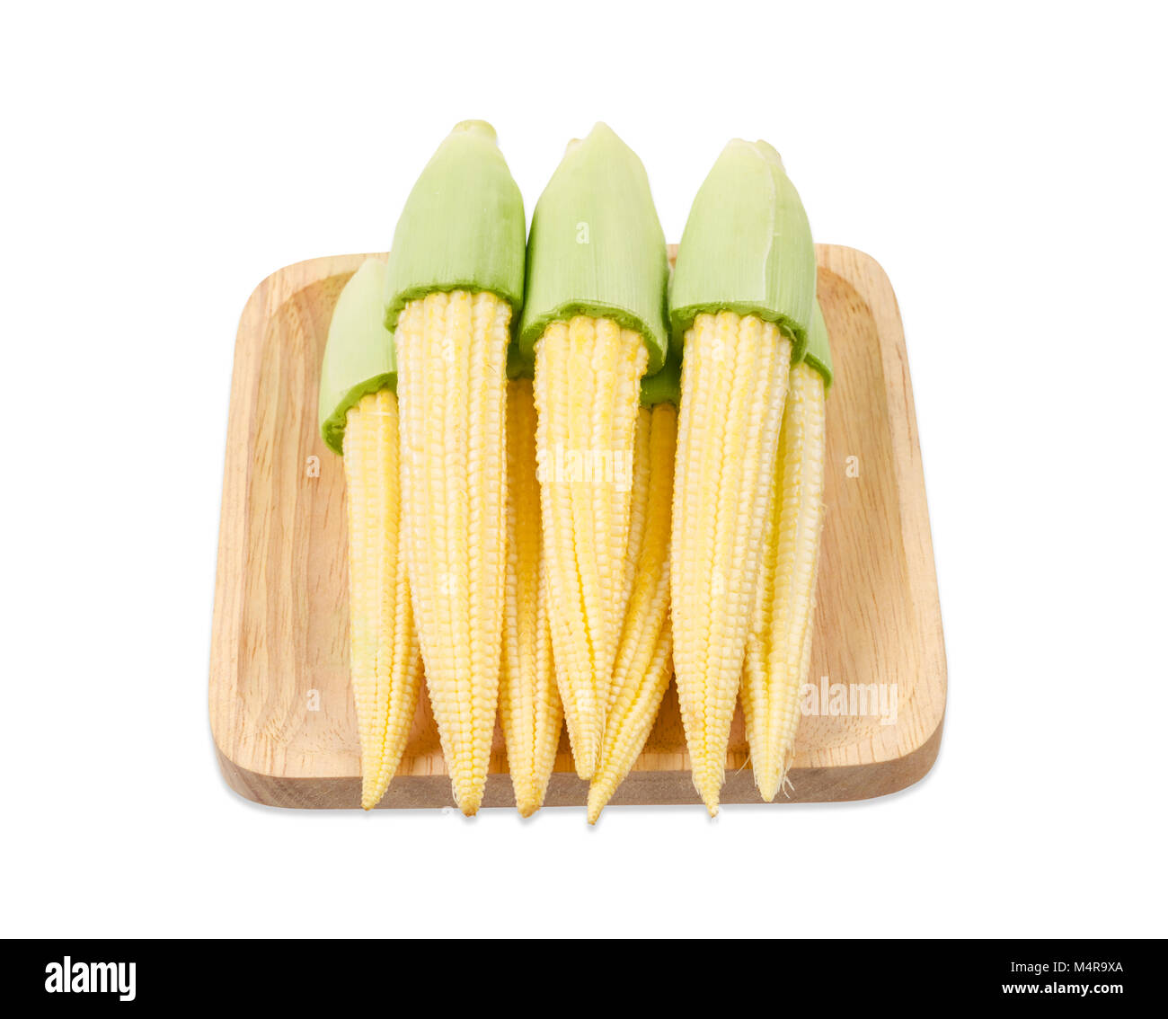 Baby corn on wooden dish isolated on white background, Save clipping ...