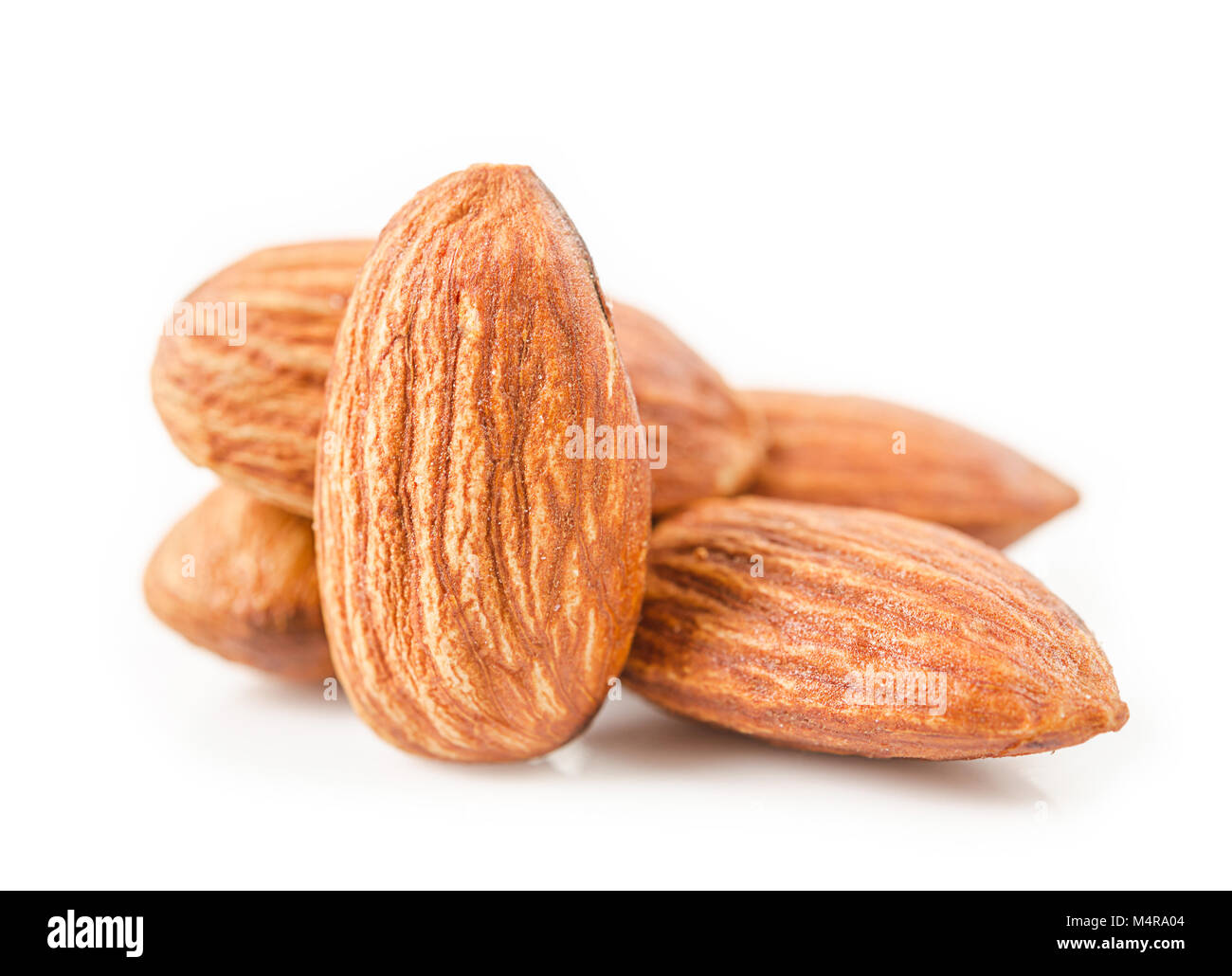 Almonds isolated on the white background Stock Photo - Alamy