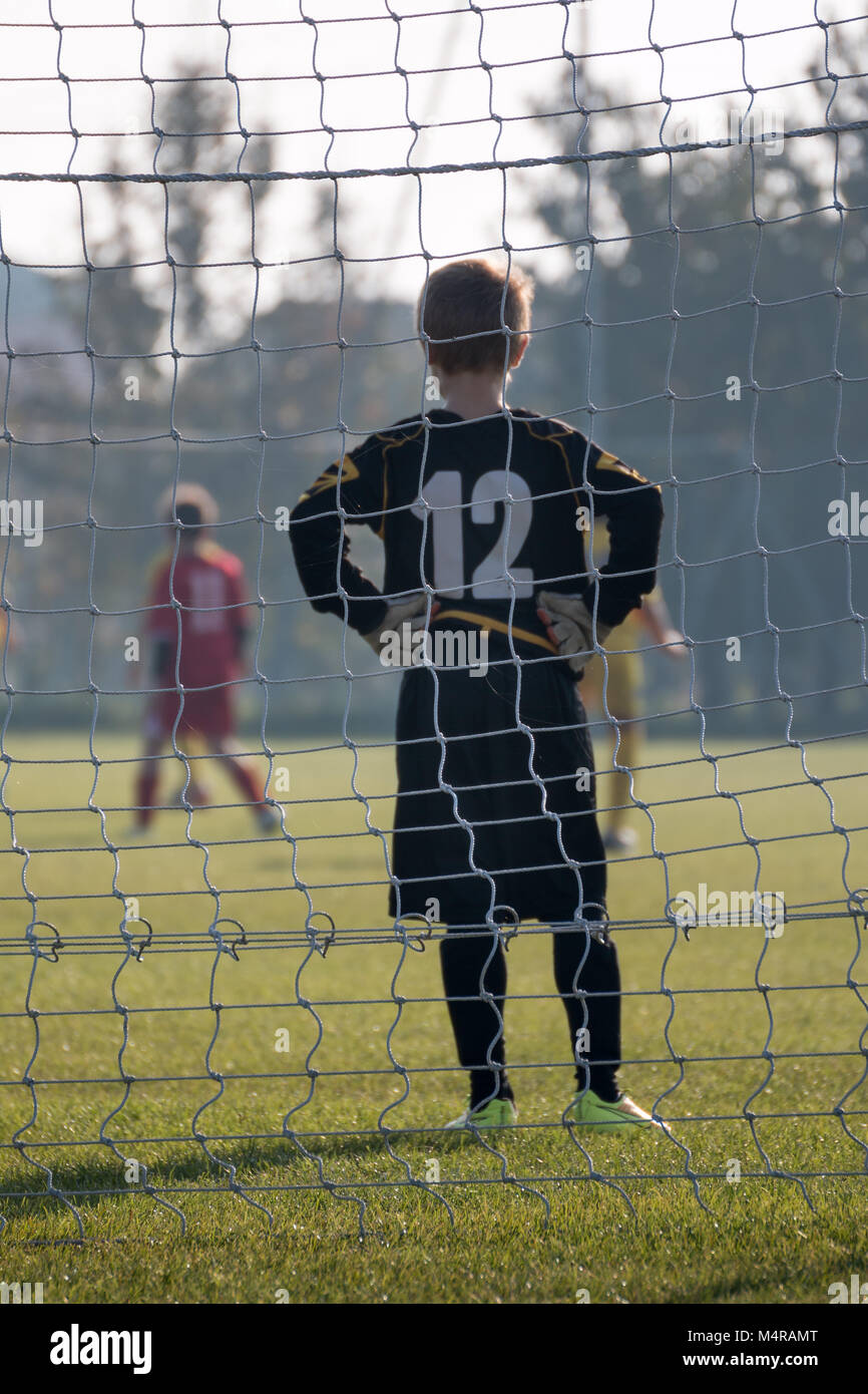 Little Soccer Player: Goalkeeper with Gloves in front of Goal Stock ...