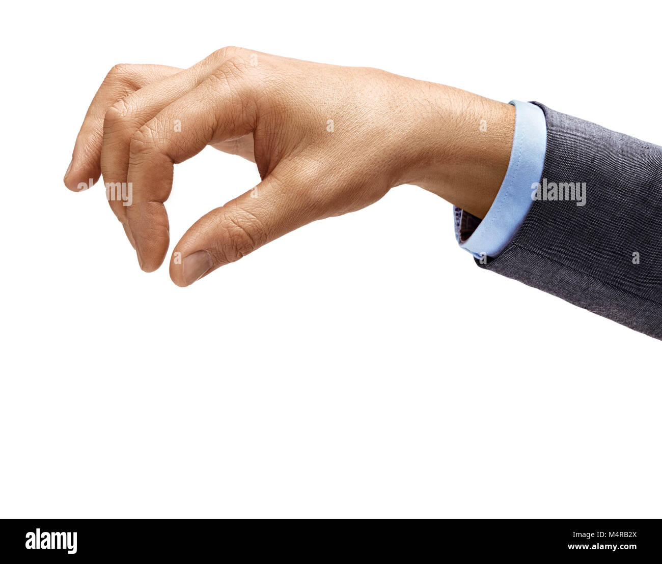 Man's hand in suit hold something isolated on white background. Close ...