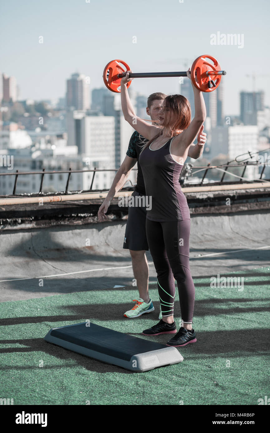 Female on a roof hi-res stock photography and images - Alamy