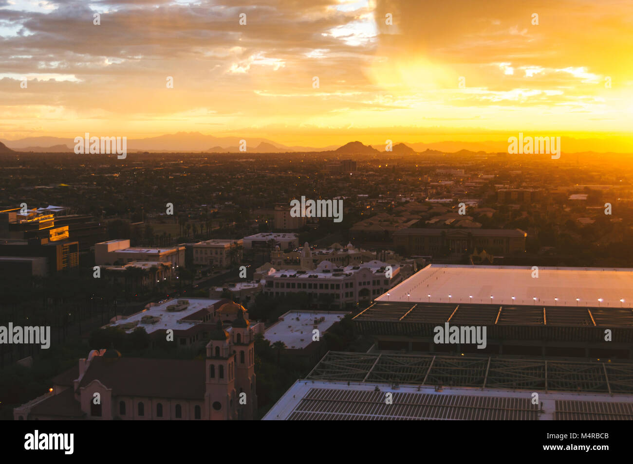 Panoramic view of Phoenix, Arizona, skyline at sunrise. Camelback ...