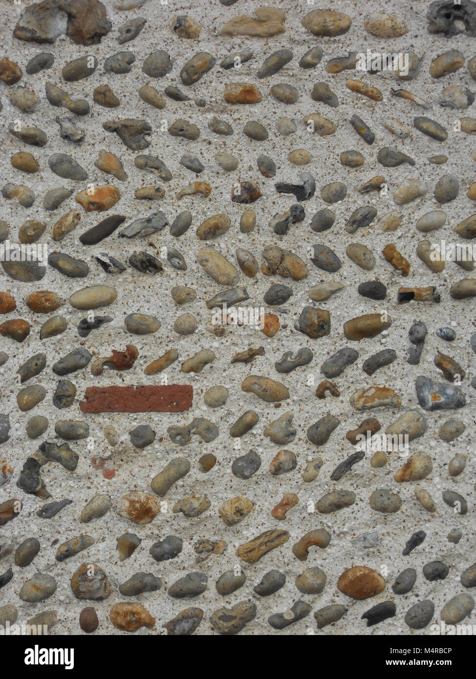 Wall of Stones Set in Mortar Stock Photo - Alamy