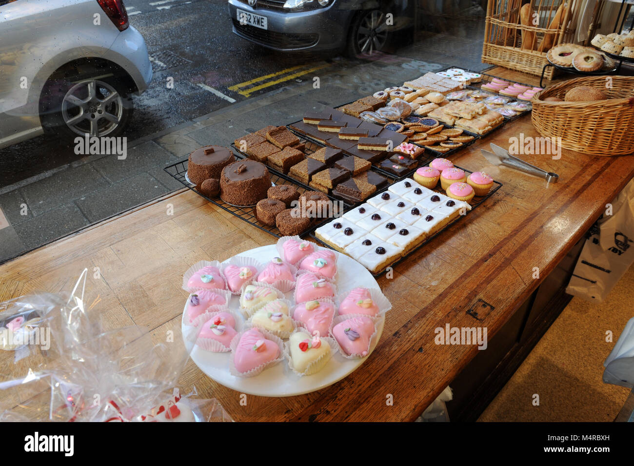 Cakes in Elizabeth Bothams window, Whitby, North Yorkshire, UK Stock ...