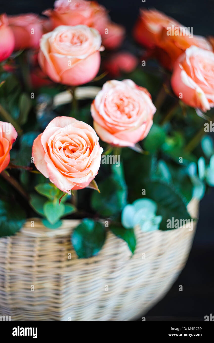 Busket with fresh roses as a anniversary card concept Stock Photo - Alamy