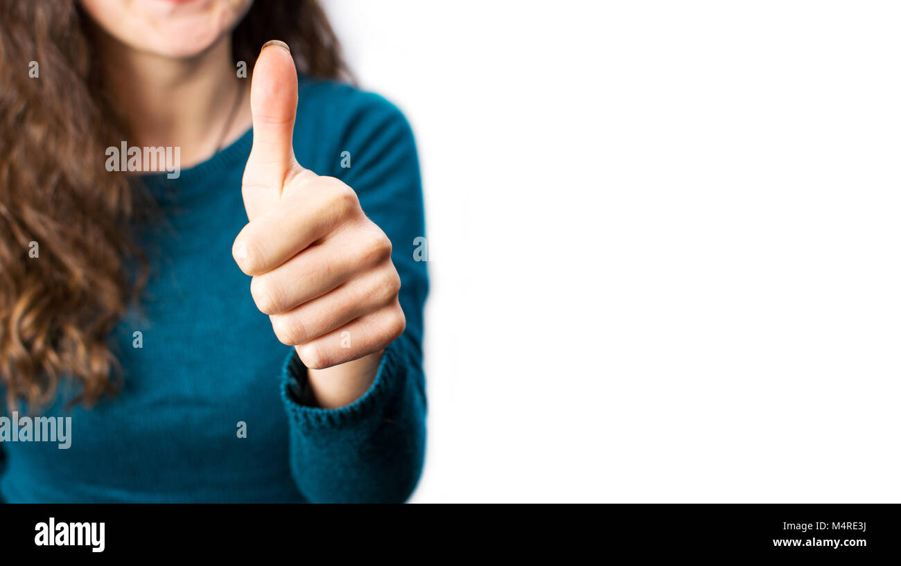 Female showing a thumbs up gesture close up Stock Photo - Alamy