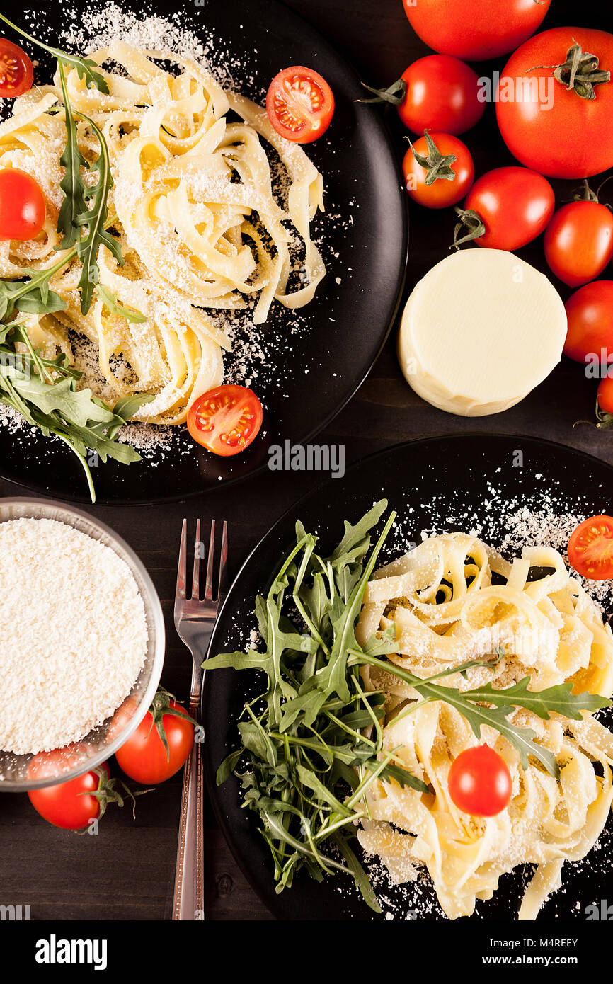 Over top view of tagliatelle pasta Stock Photo - Alamy