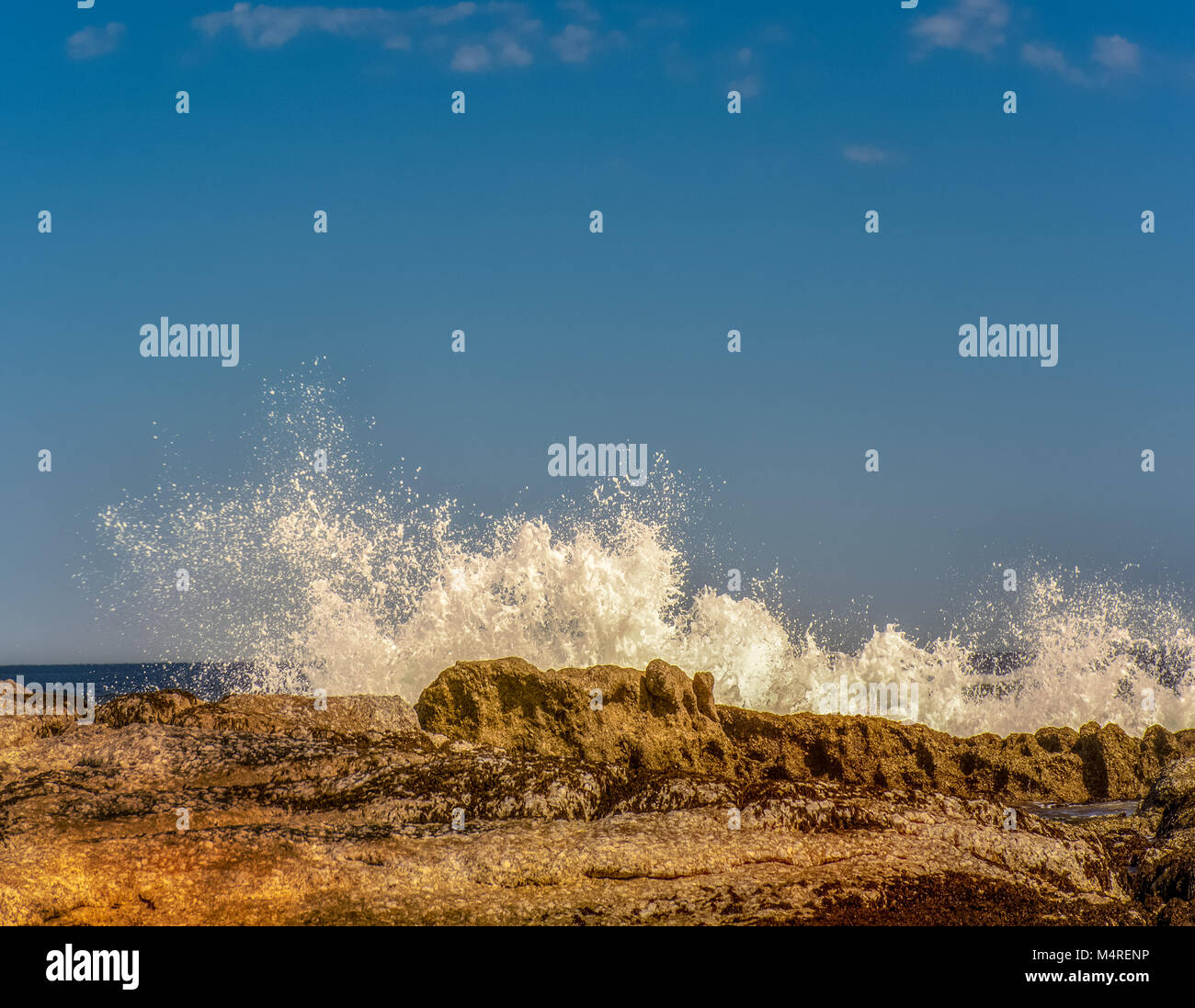 Colorful seascape image of a rough atlantic ocean with waves, rocks and ...