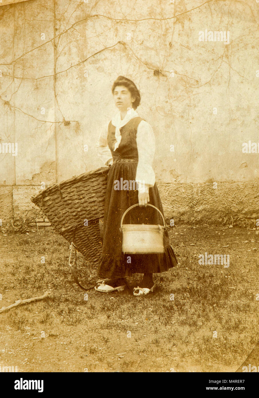 A young woman dressed as a peasant. the picture was taken in 1897, near ...