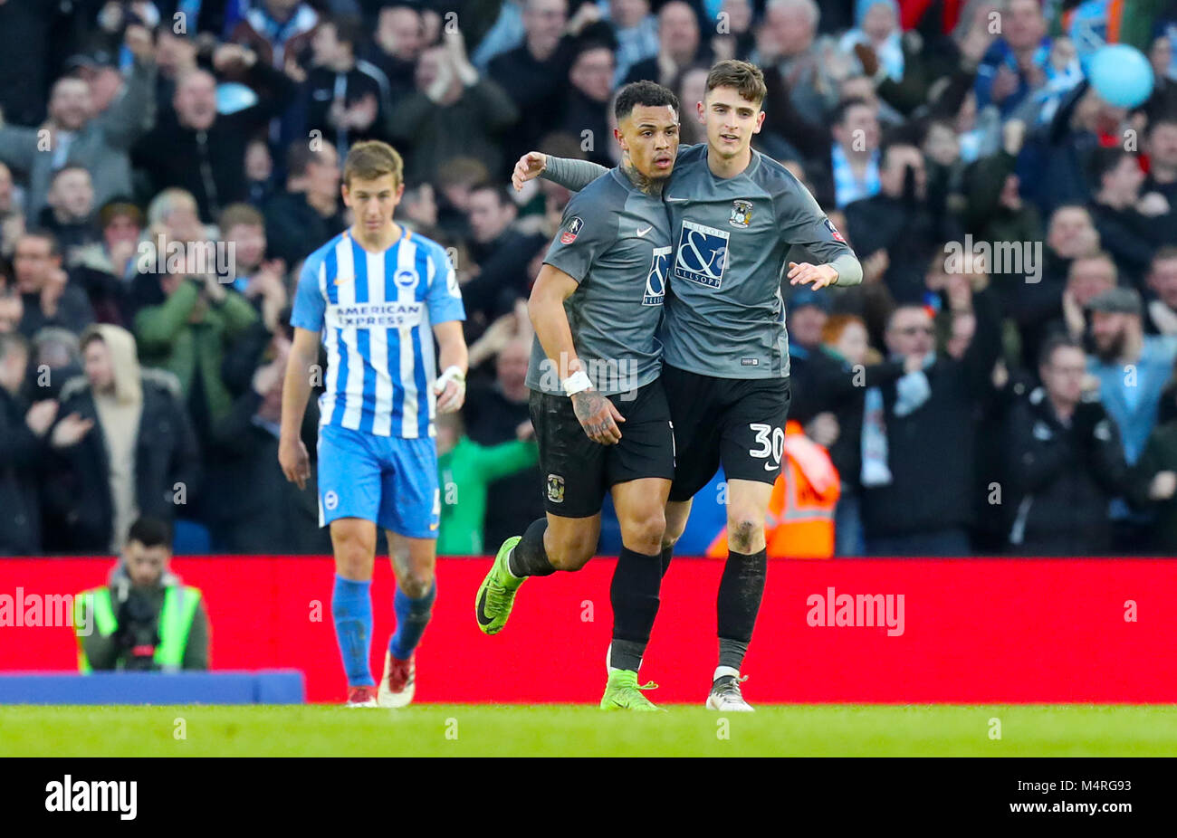 Coventry City's Jonson Clarke-Harris (left) celebrates scoring his side ...