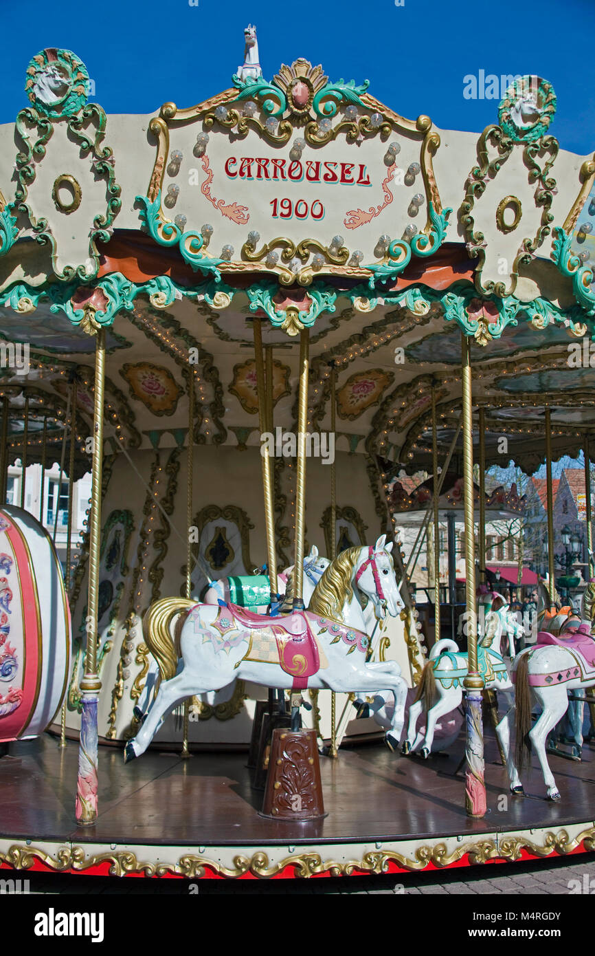 Old historical children's merry-go-round at Haguenau, Alsace, France ...