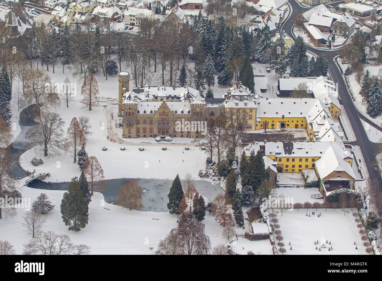 Aerial view, hunting lodge Herdringen Tudor castle in the snow, Neheim ...