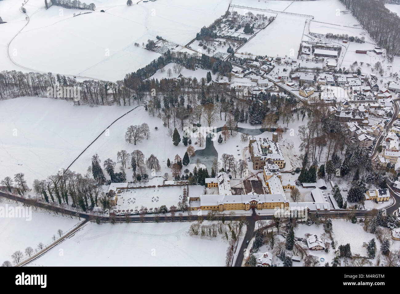 Aerial view, hunting lodge Herdringen Tudor castle in the snow, Neheim ...