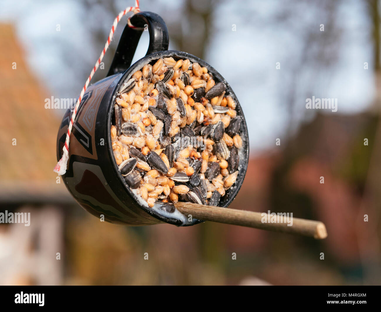 Hanging homemade bird feeder hi-res stock photography and images - Alamy