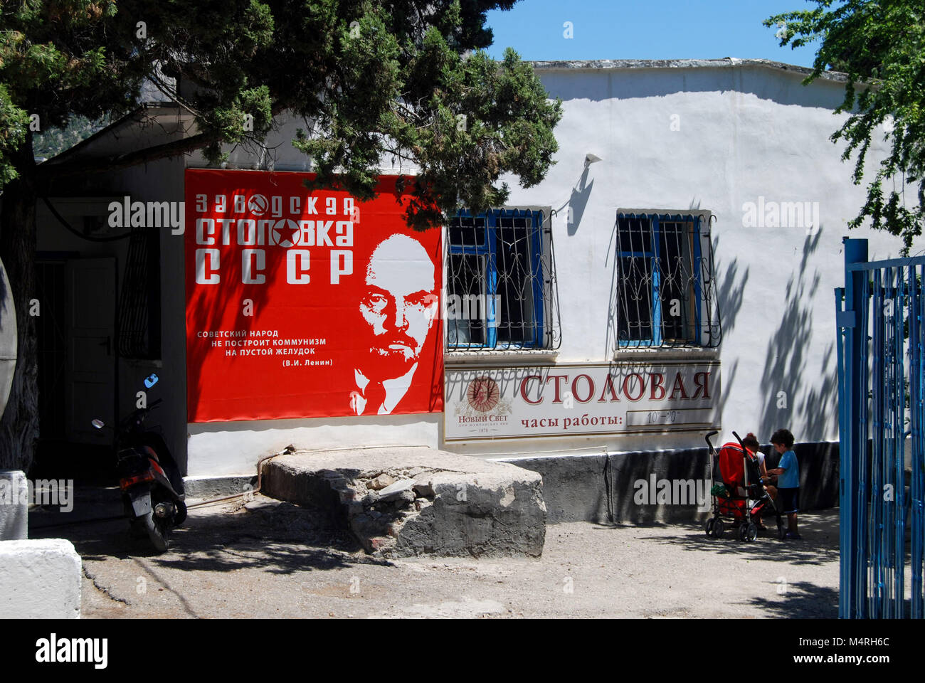 Portrait of a Vladimir Lenin is displayed at the entrance to the ...