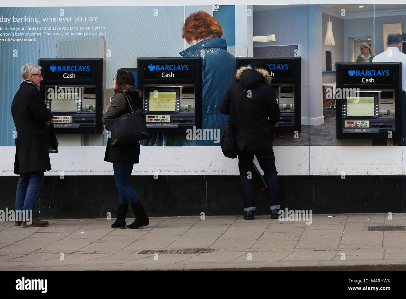 A row of five Barclays Bank cashpoint machines in central London ...