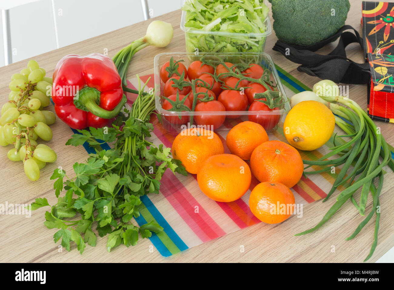 fresh vegetables straight from the market unpacked in the kitchen Stock ...