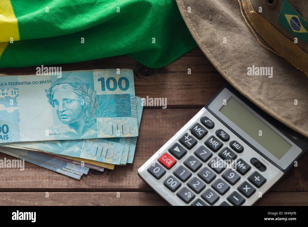 brazilian money and calculator on the wooden background Stock Photo - Alamy
