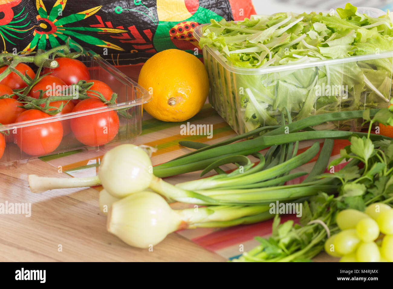 fresh vegetables straight from the market unpacked in the kitchen Stock ...
