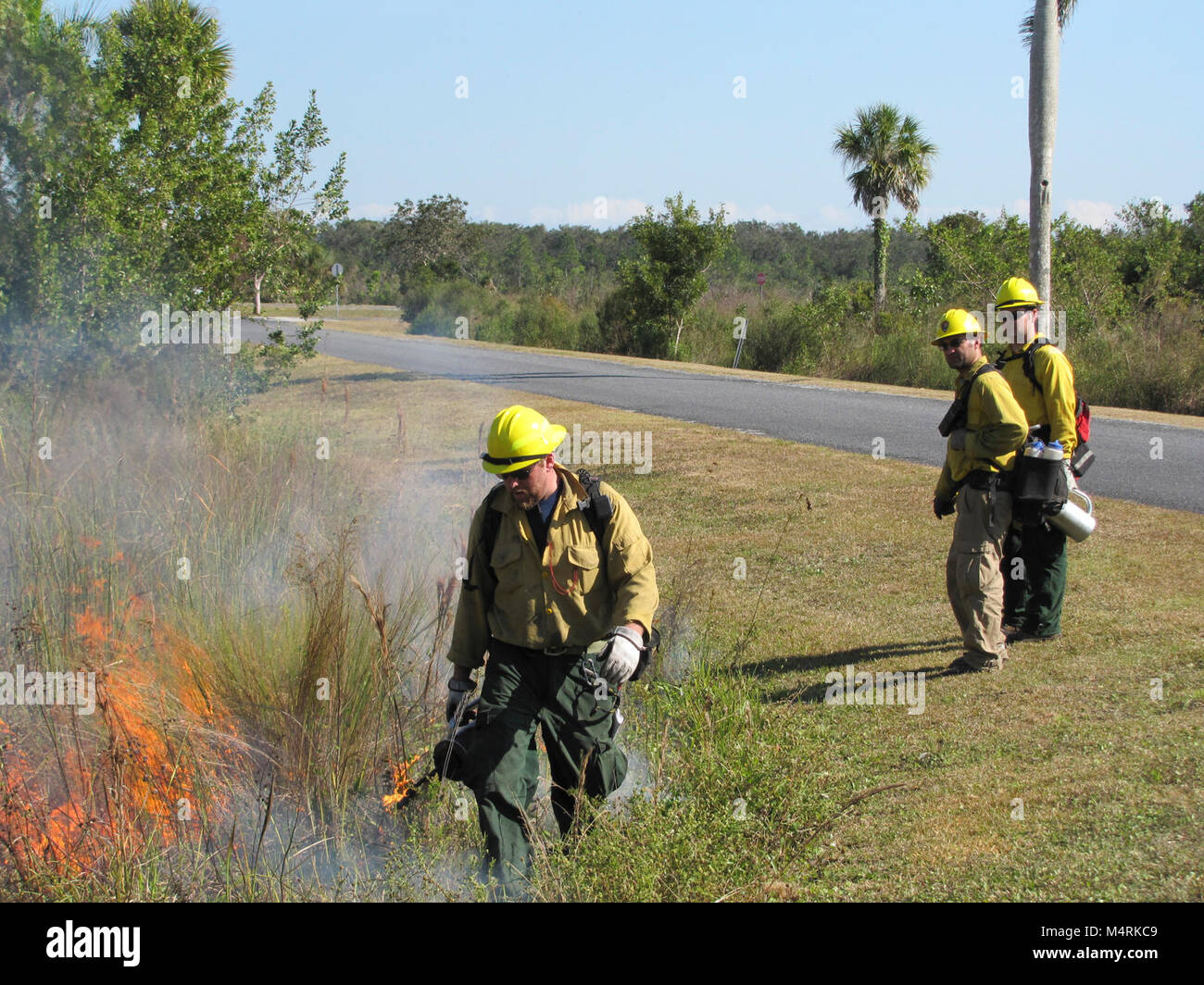 Prescribed fire near park structures Stock Photo - Alamy