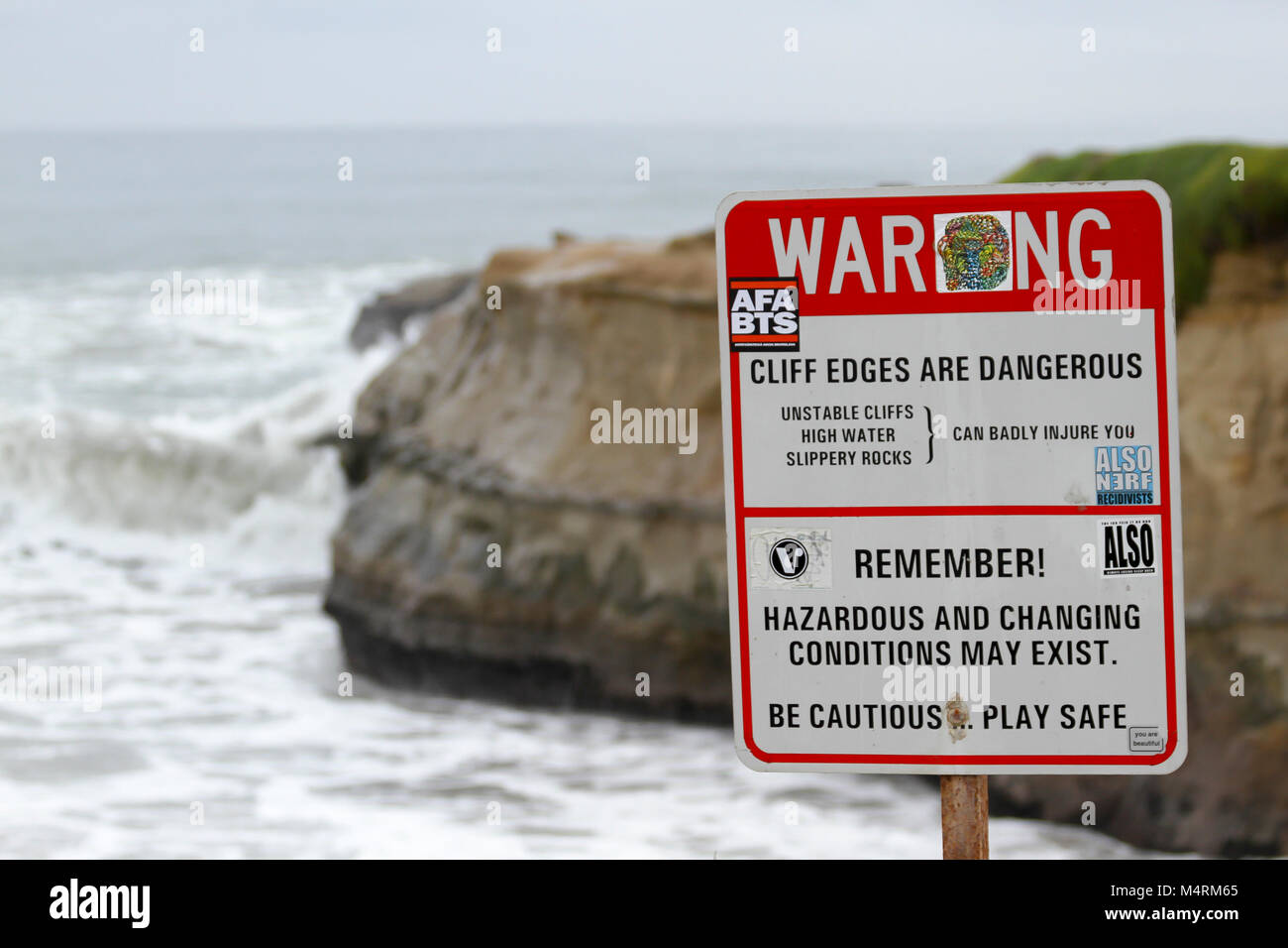 Warning sign near cliffs, Santa Cruz, California, United States Stock ...
