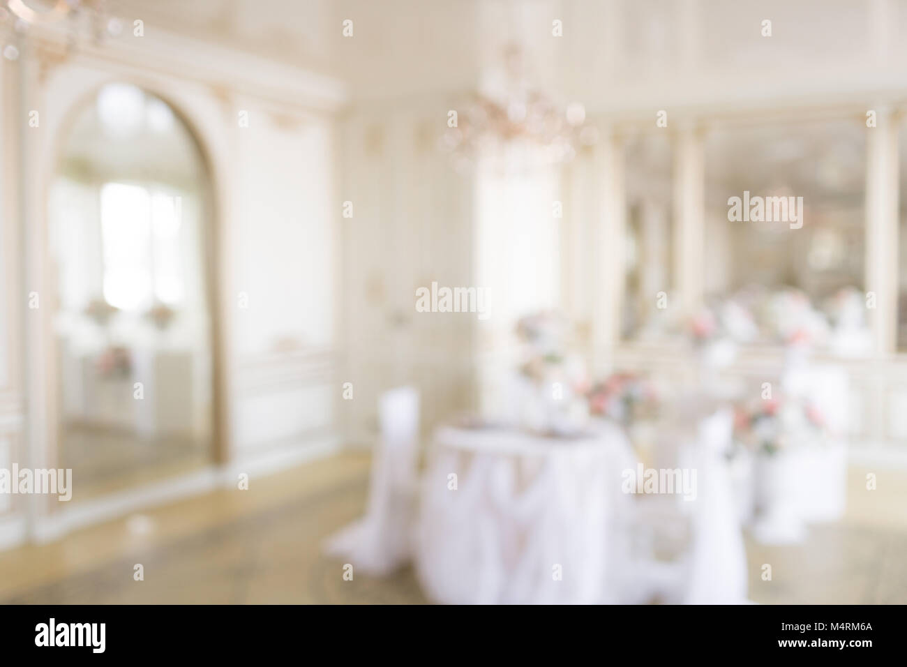 abstract blur. decorated table and chairs for a festive dinner. Luxury ...
