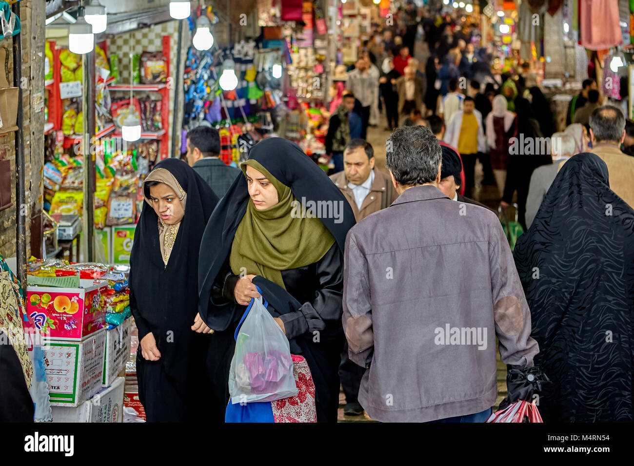 Tehran, Iran - April 29, 2017: Iranian women in hijab buy things in a ...