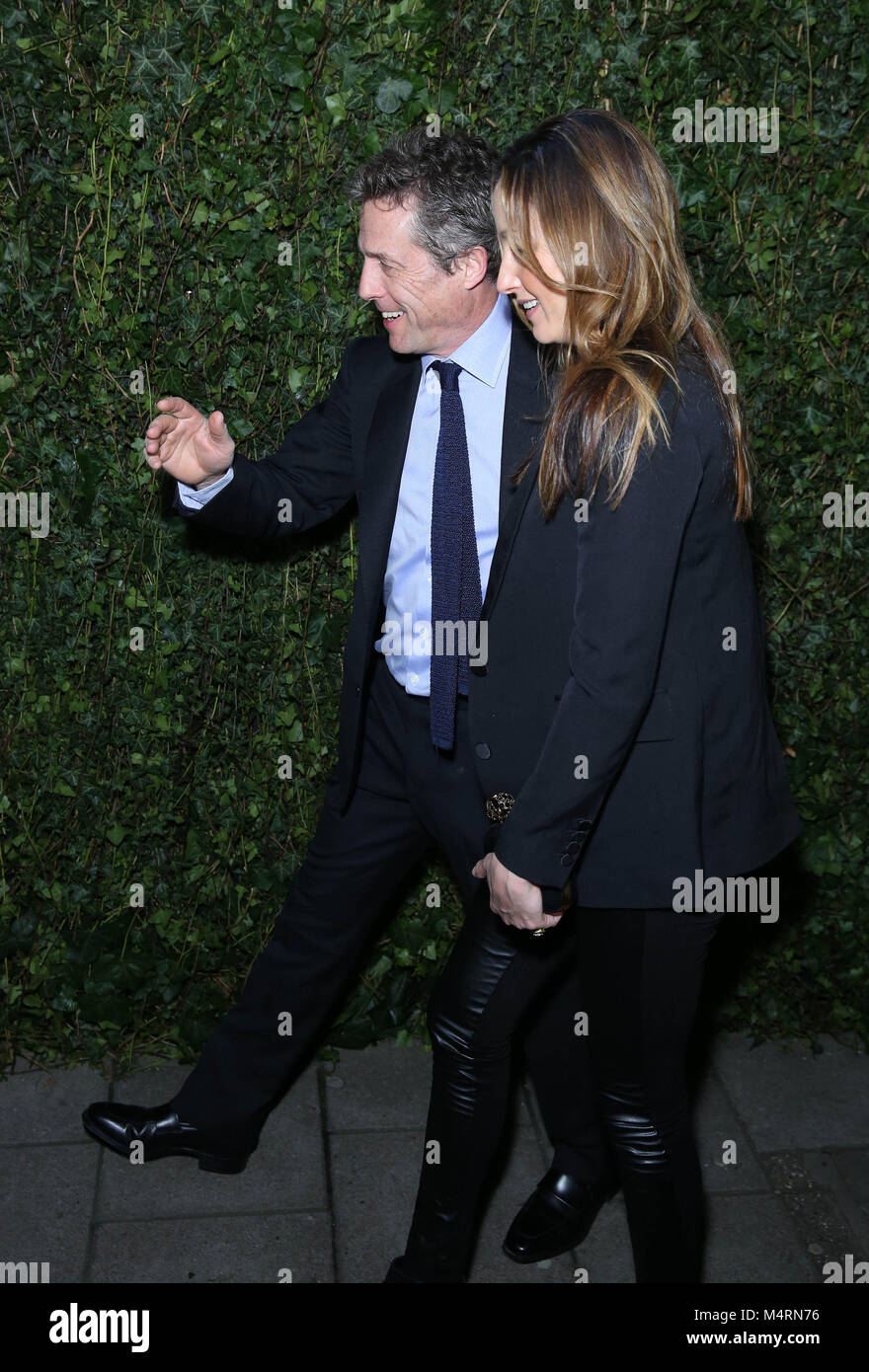 Hugh Grant arriving at the Charles Finch and Chanel pre-Bafta party at ...
