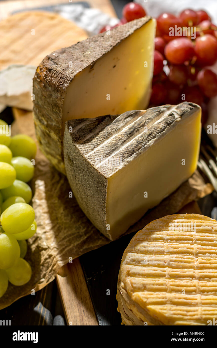 Tasting of oldest french AOC soft pudgent yellow cheese Livarot ...