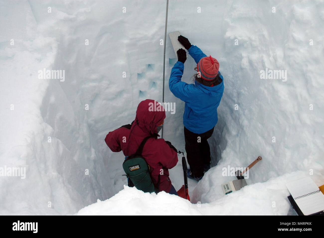 Digging snow pits on a glacier gives scientists valuable information on ...