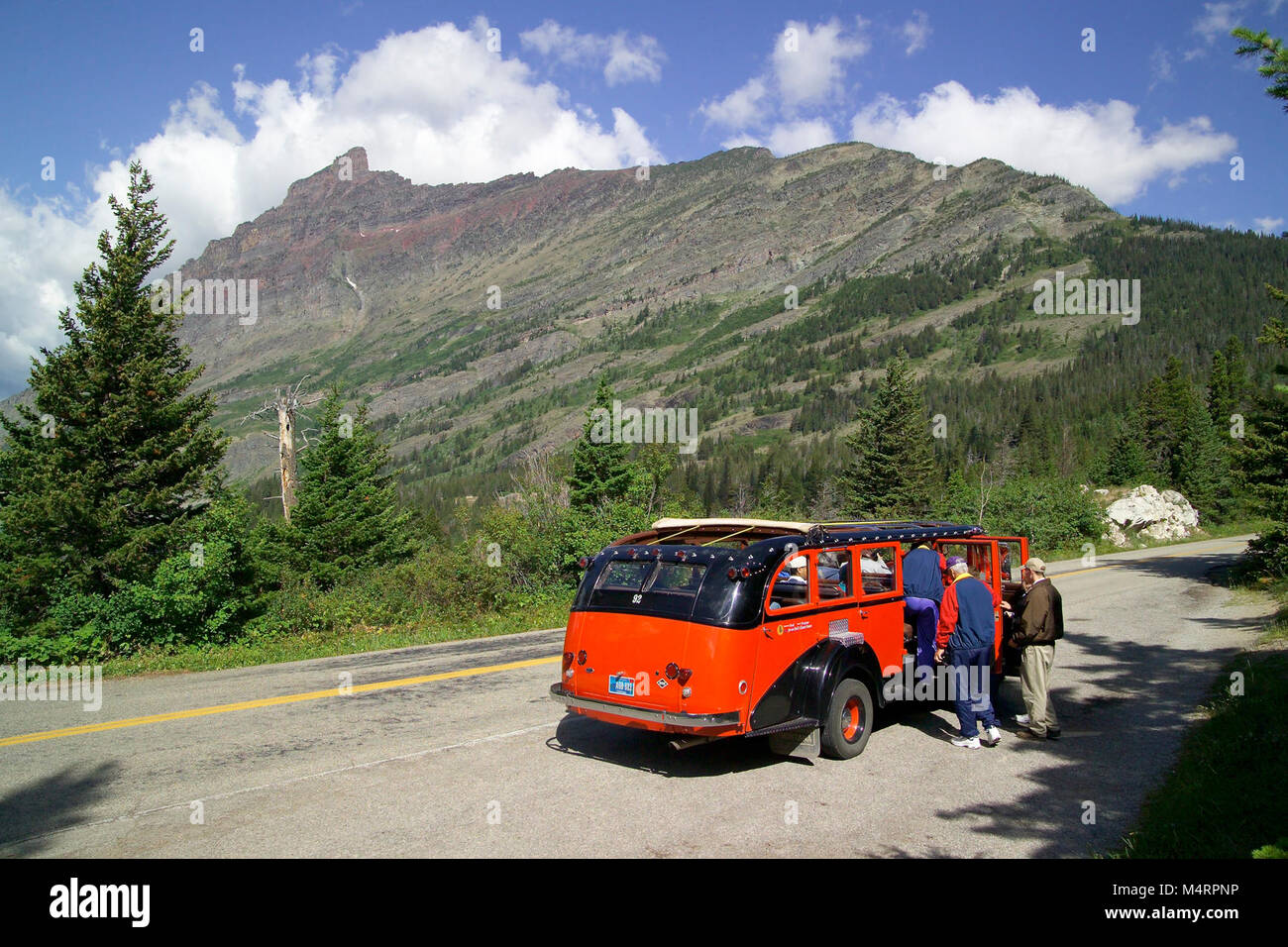 Red bus tours glacier national hi-res stock photography and images - Alamy