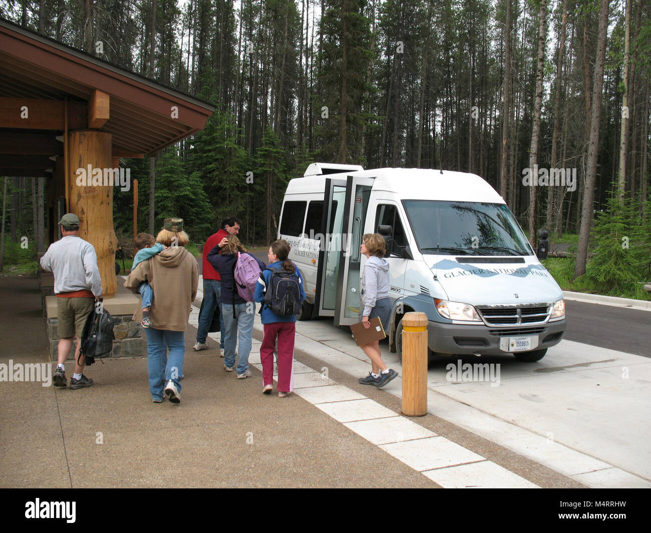 Visitors boarding a shuttle bus..Shuttle Bus Stock Photo - Alamy