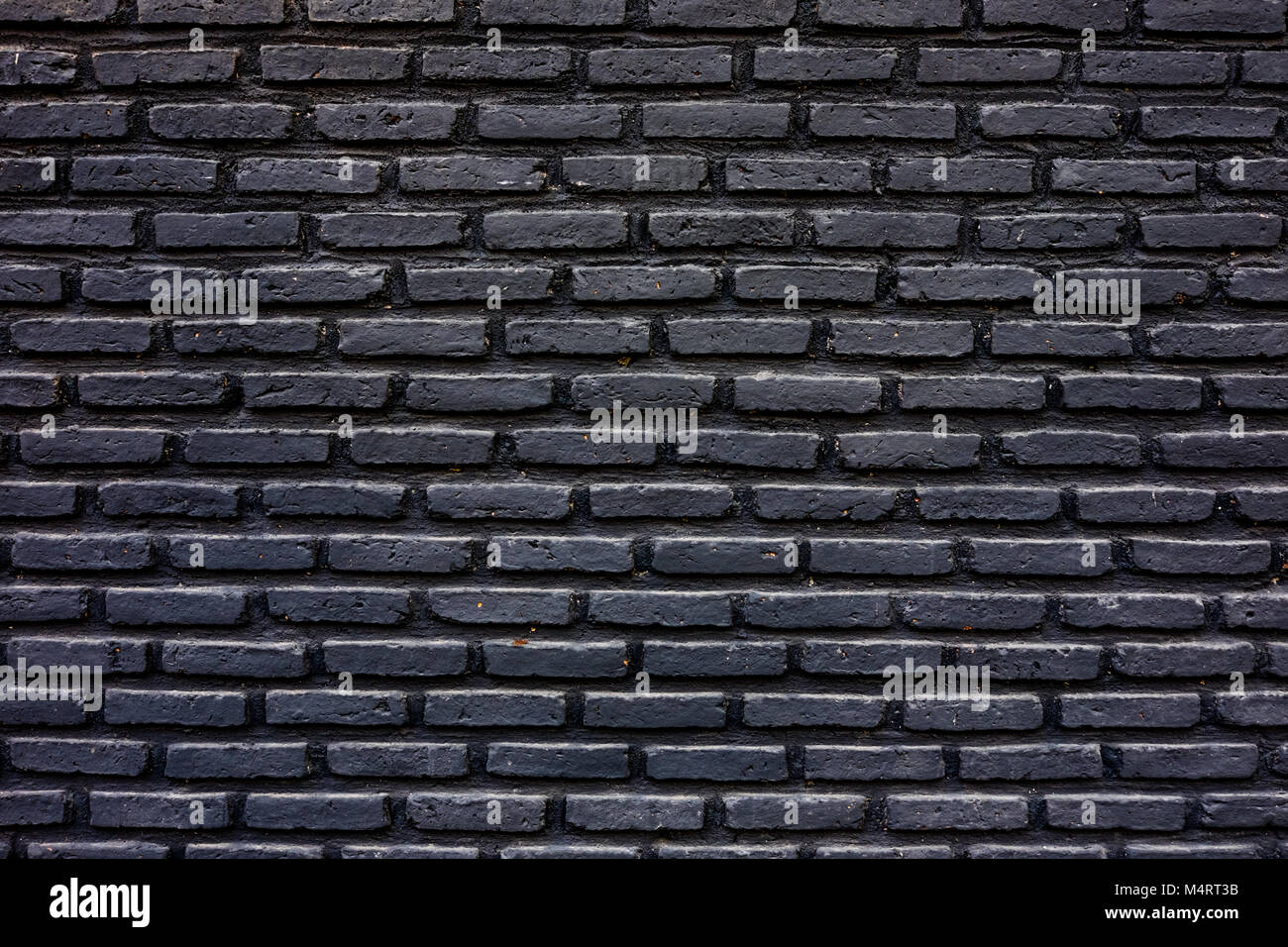 Brick in black colour work wall pattern, craftmanship in construction ...