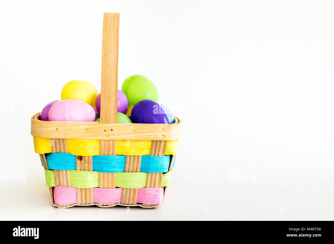 Easter basket filled plastic eggs hi-res stock photography and images ...