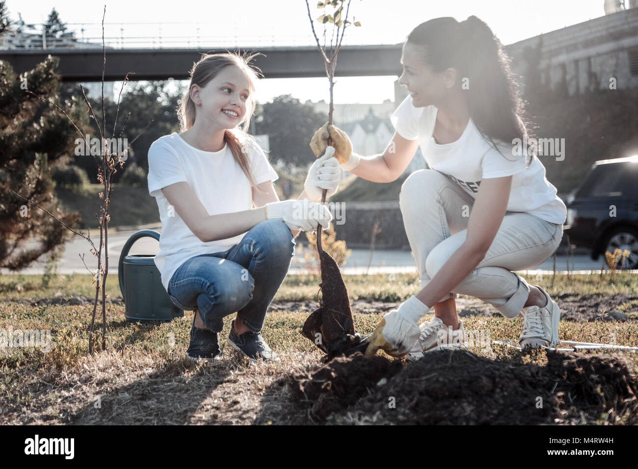 Children planting tree hi-res stock photography and images - Alamy