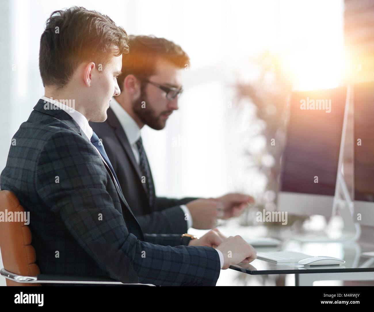 employees work with computers in a modern office Stock Photo - Alamy