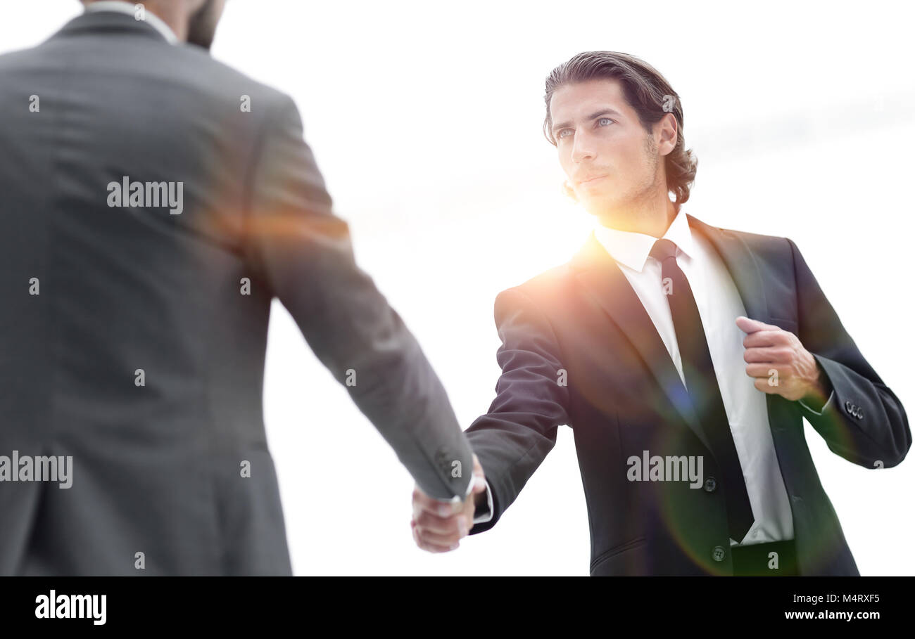 welcome and handshake of business partners Stock Photo - Alamy