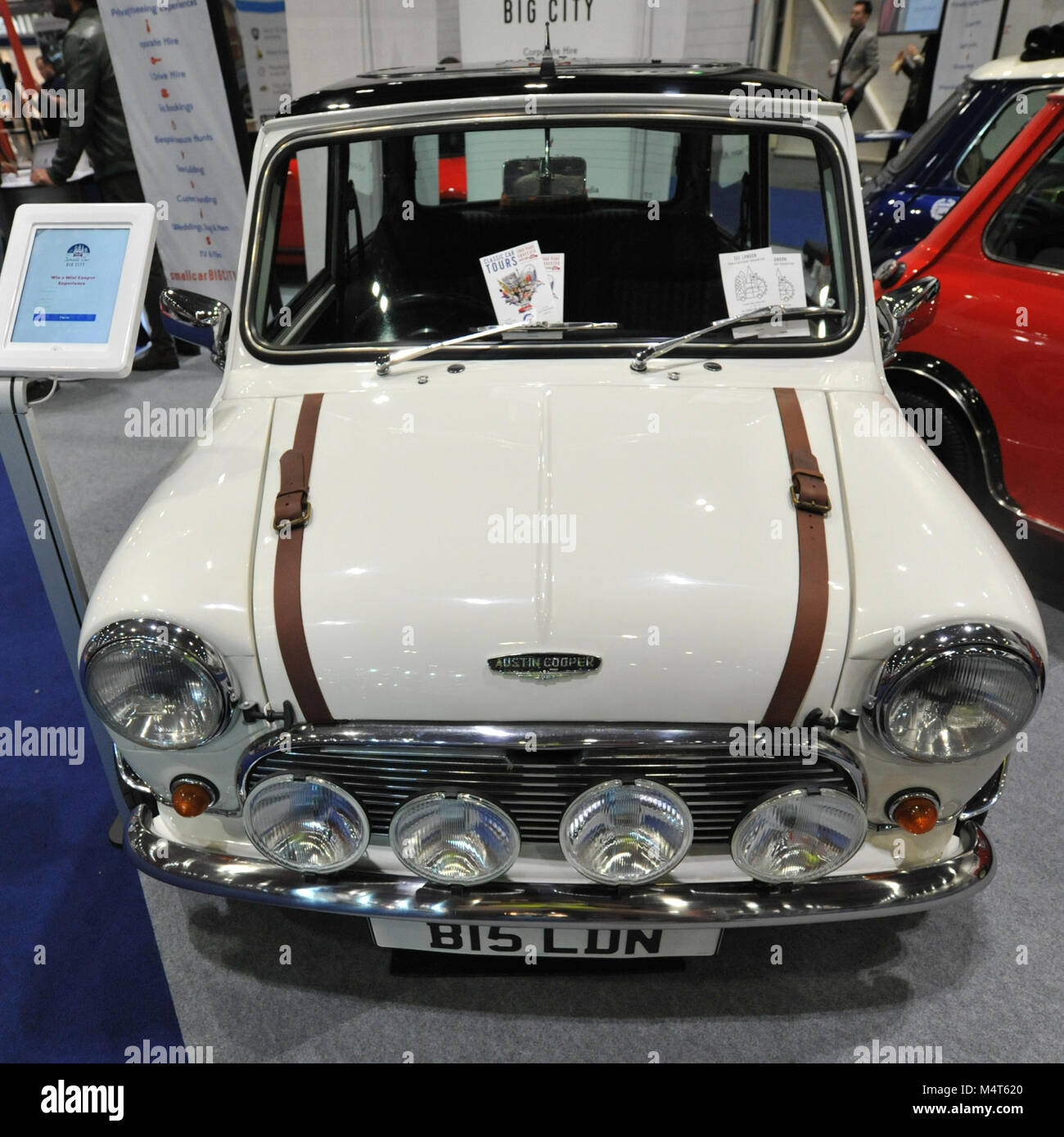 A vintage Mini on display at the London Classic Car Show which is ...