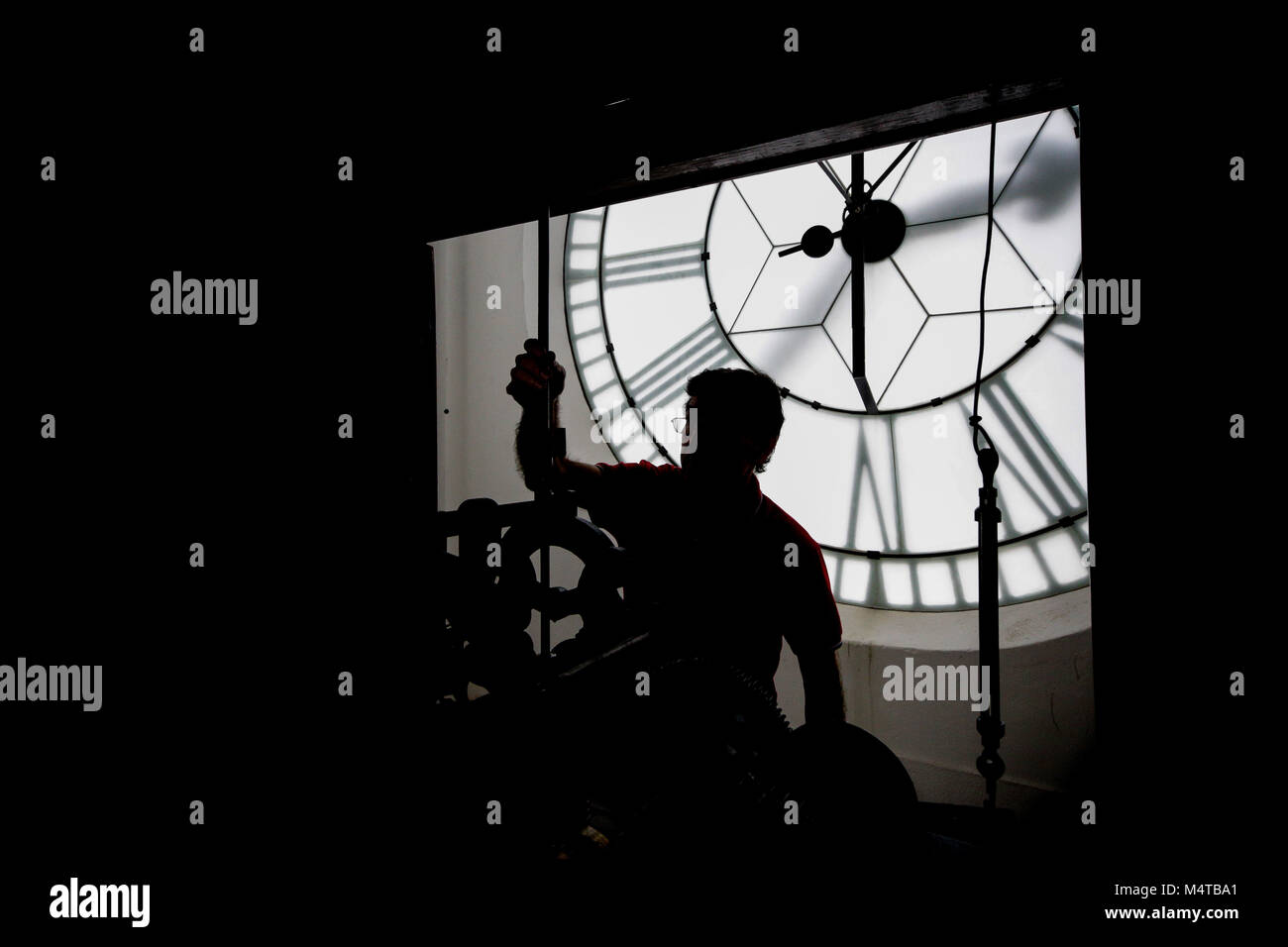 Sao Paulo, Brazil. 18th Feb, 2018. a watchmaker sets the a giant clock ...