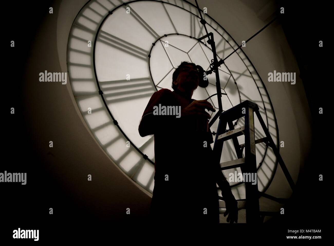 Sao Paulo, Brazil. 18th Feb, 2018. a watchmaker sets the a giant clock ...