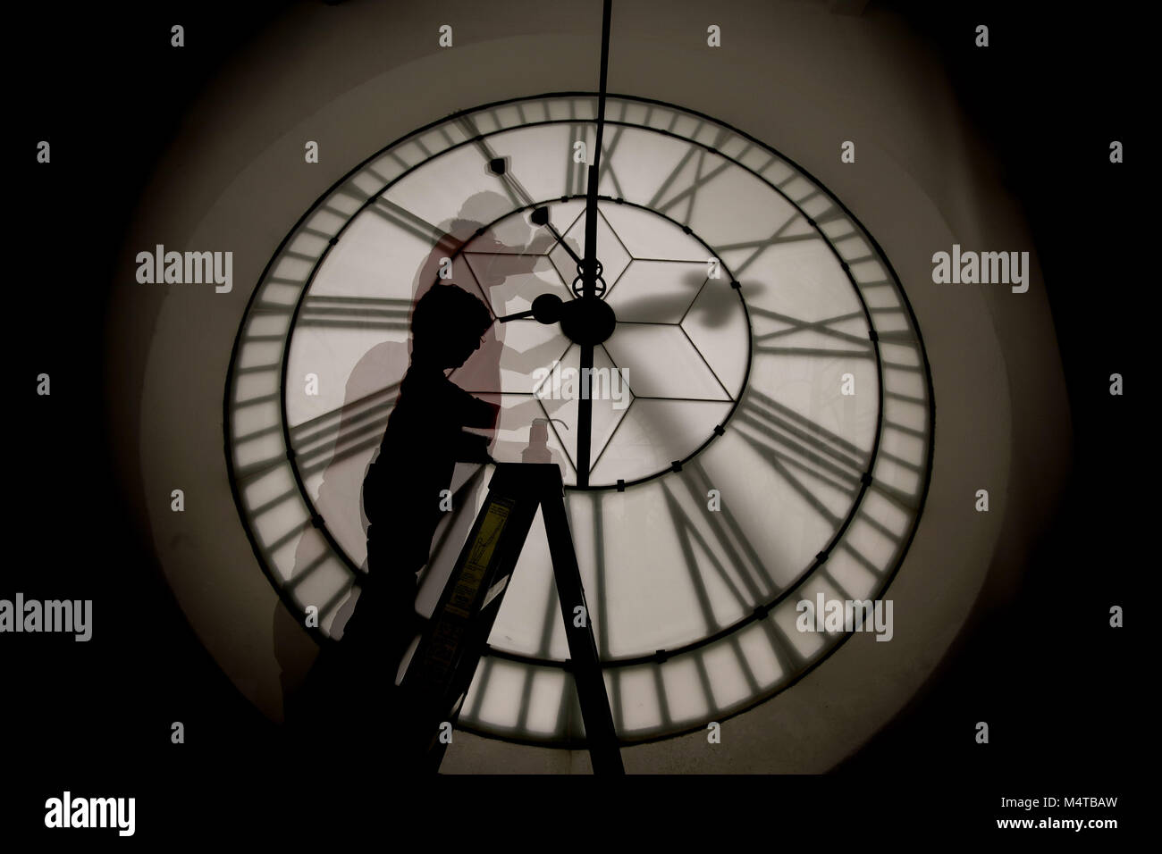 Sao Paulo, Brazil. 18th Feb, 2018. a watchmaker sets the a giant clock ...