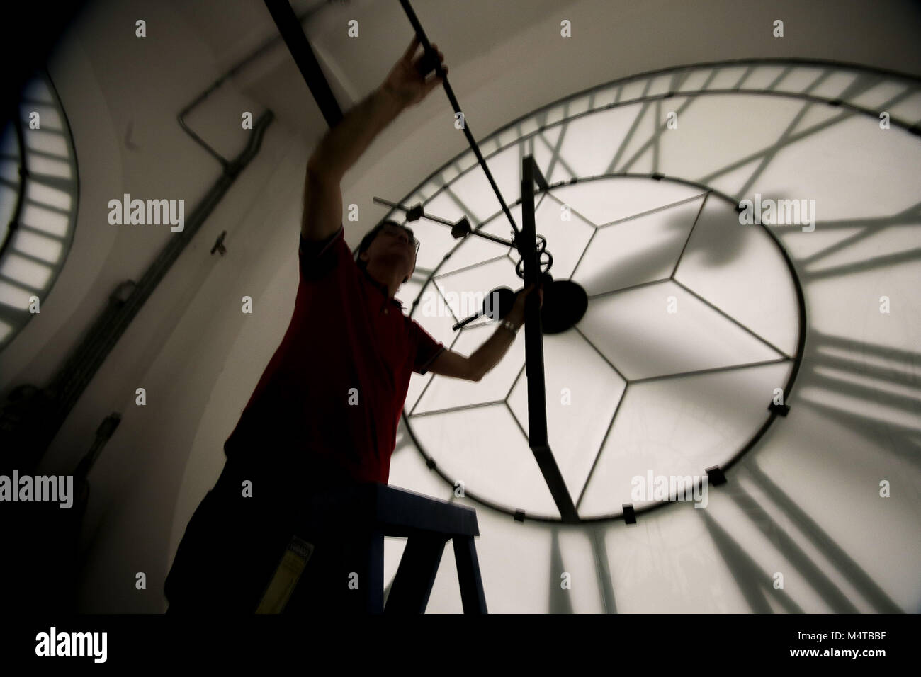 Sao Paulo, Brazil. 18th Feb, 2018. a watchmaker sets the a giant clock ...