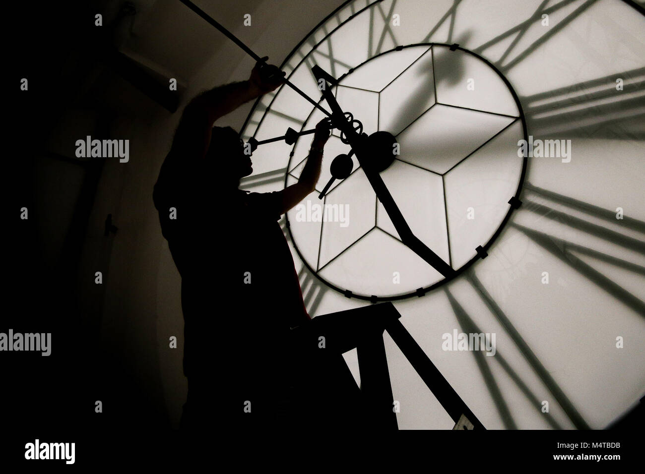 Sao Paulo, Brazil. 18th Feb, 2018. a watchmaker sets the a giant clock ...