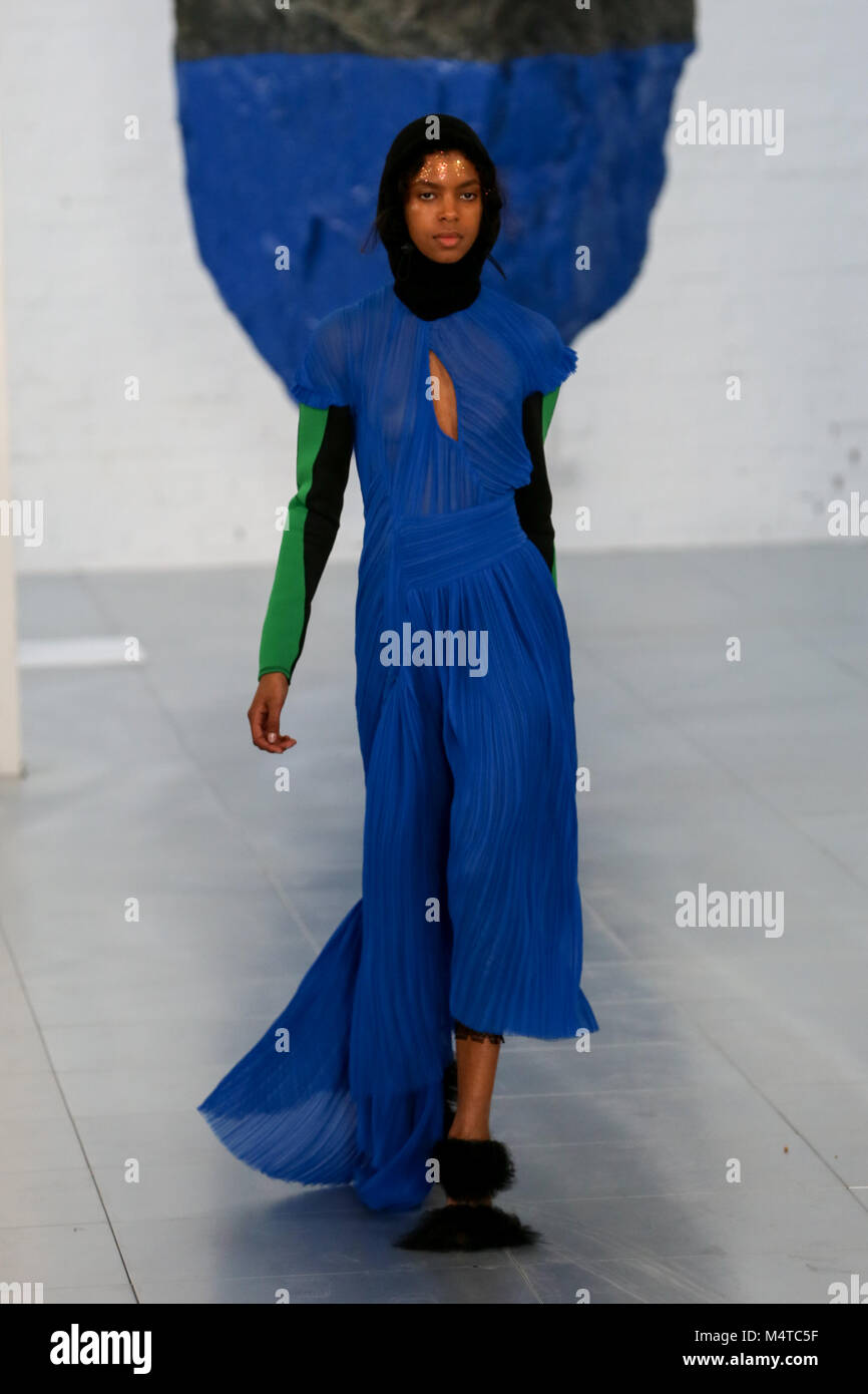 London, UK. 18th Feb, 2018. A model walk the runway at the Preen by ...