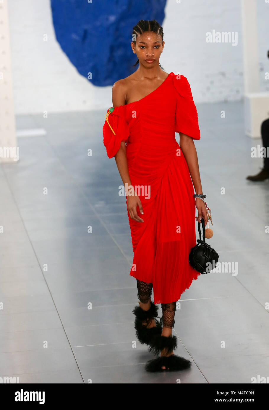 London, UK. 18th Feb, 2018. A model walk the runway at the Preen by ...