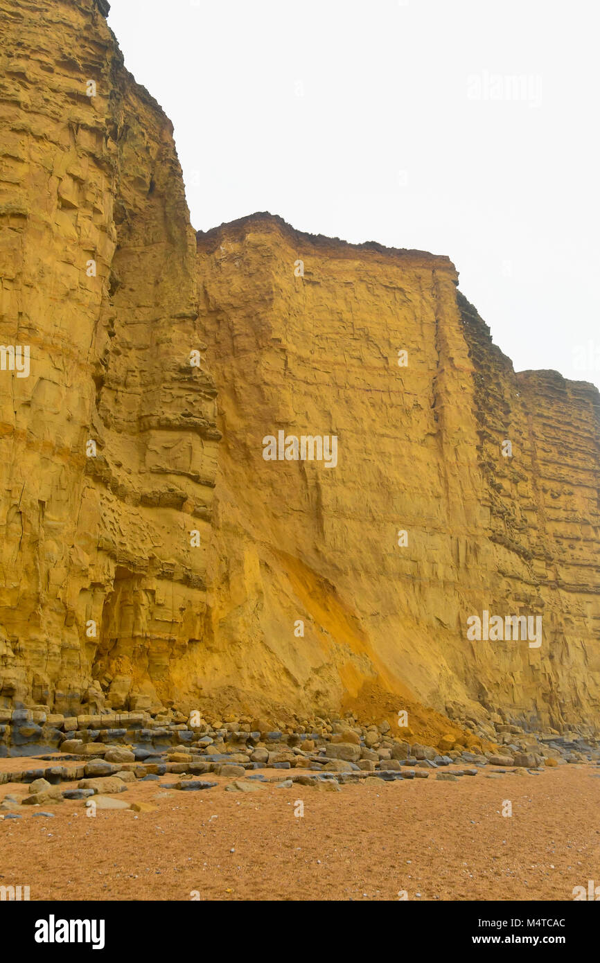 West Bay, Dorset, UK. 18th February 2018. UK Weather. A small cliff ...