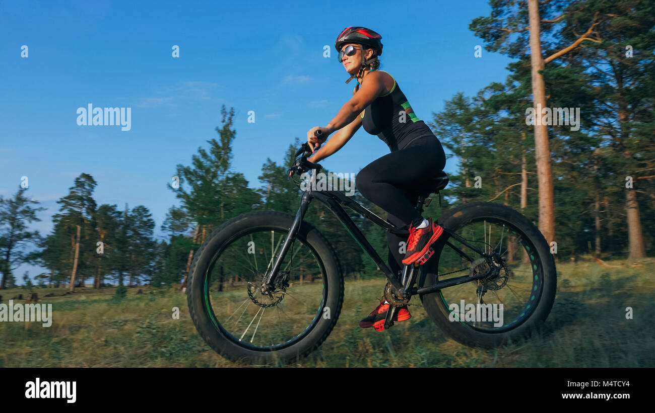 Fat bike also called fatbike or fat-tire bike in summer riding in the ...